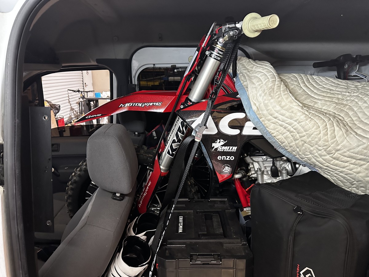 Two full sized dirt bikes in a 1st gen Transit Connect - Moto-Related ...
