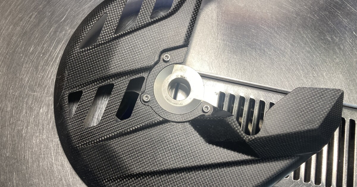 Anyone good with KTM part numbers? Disc brake guard fitment issues ...